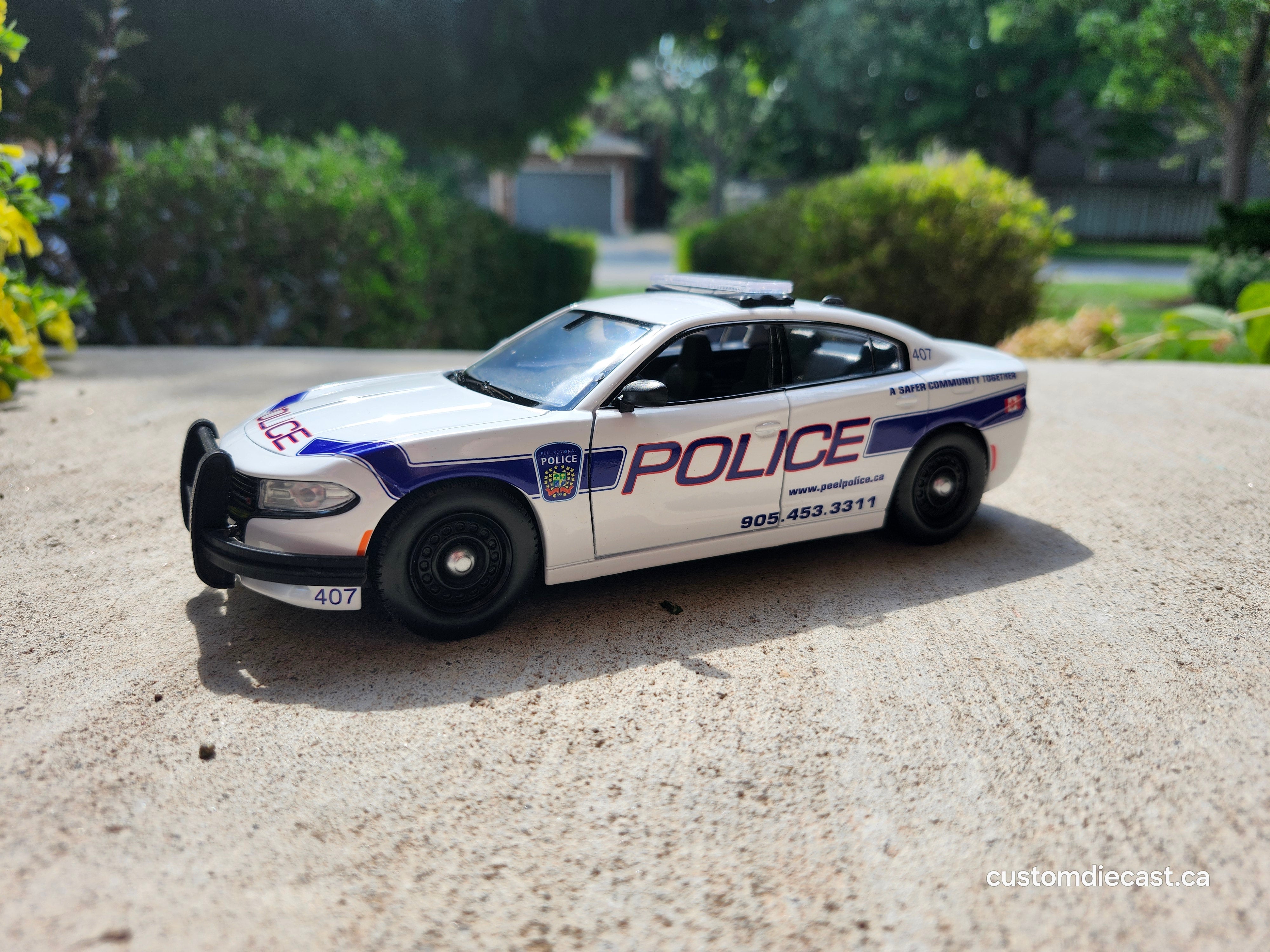 Motormax 43 scale Peel Regional Police 2023 Dodge Charger with display ...